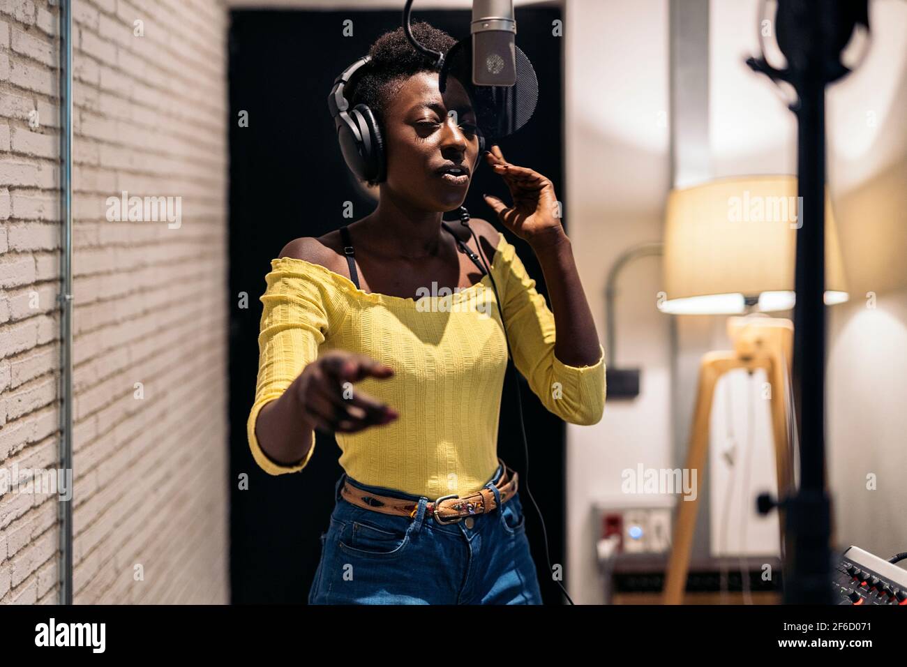 Beautiful female singer working in hi-res stock photography and images ...