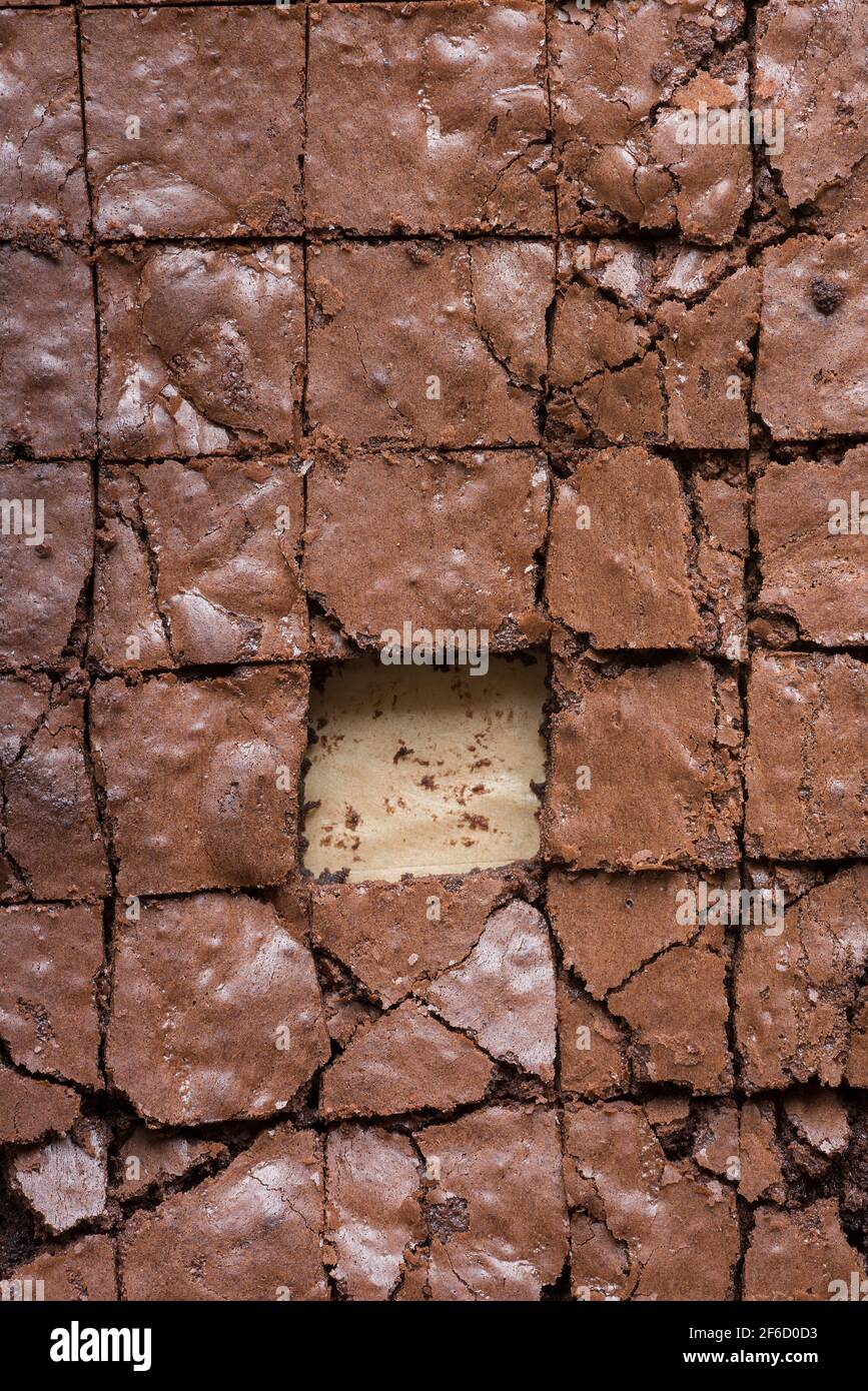 Ready to eat sliced double chocolate brownies hot from oven cut into ...