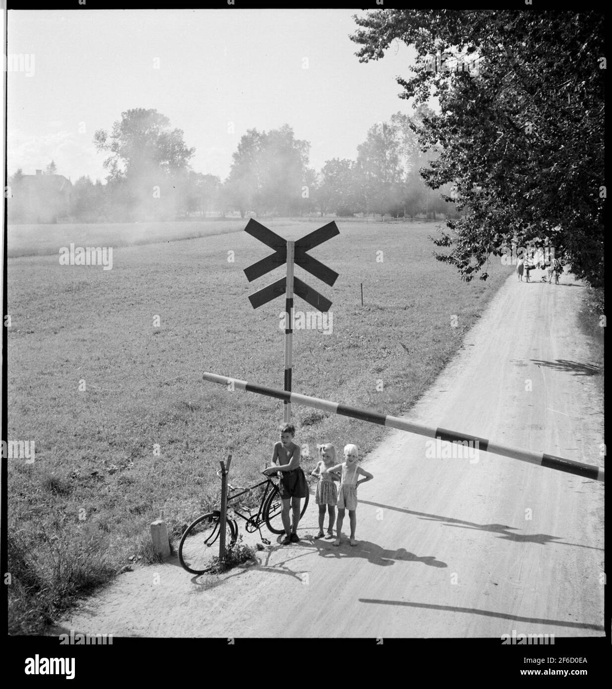 Children standing at a railway bom Stock Photo - Alamy