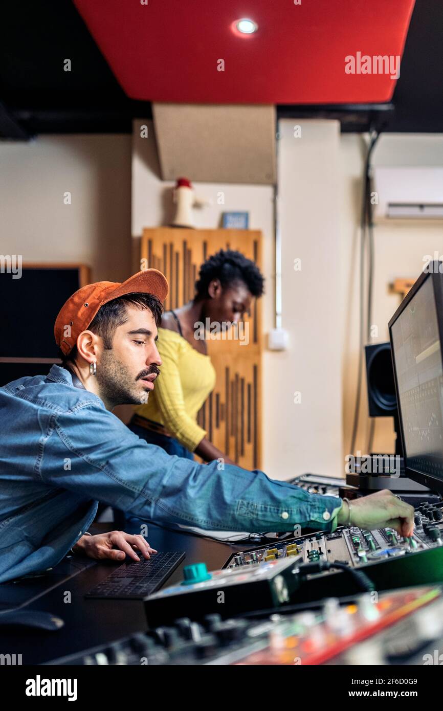 Stock photo of cool artists working in professional music studio Stock ...