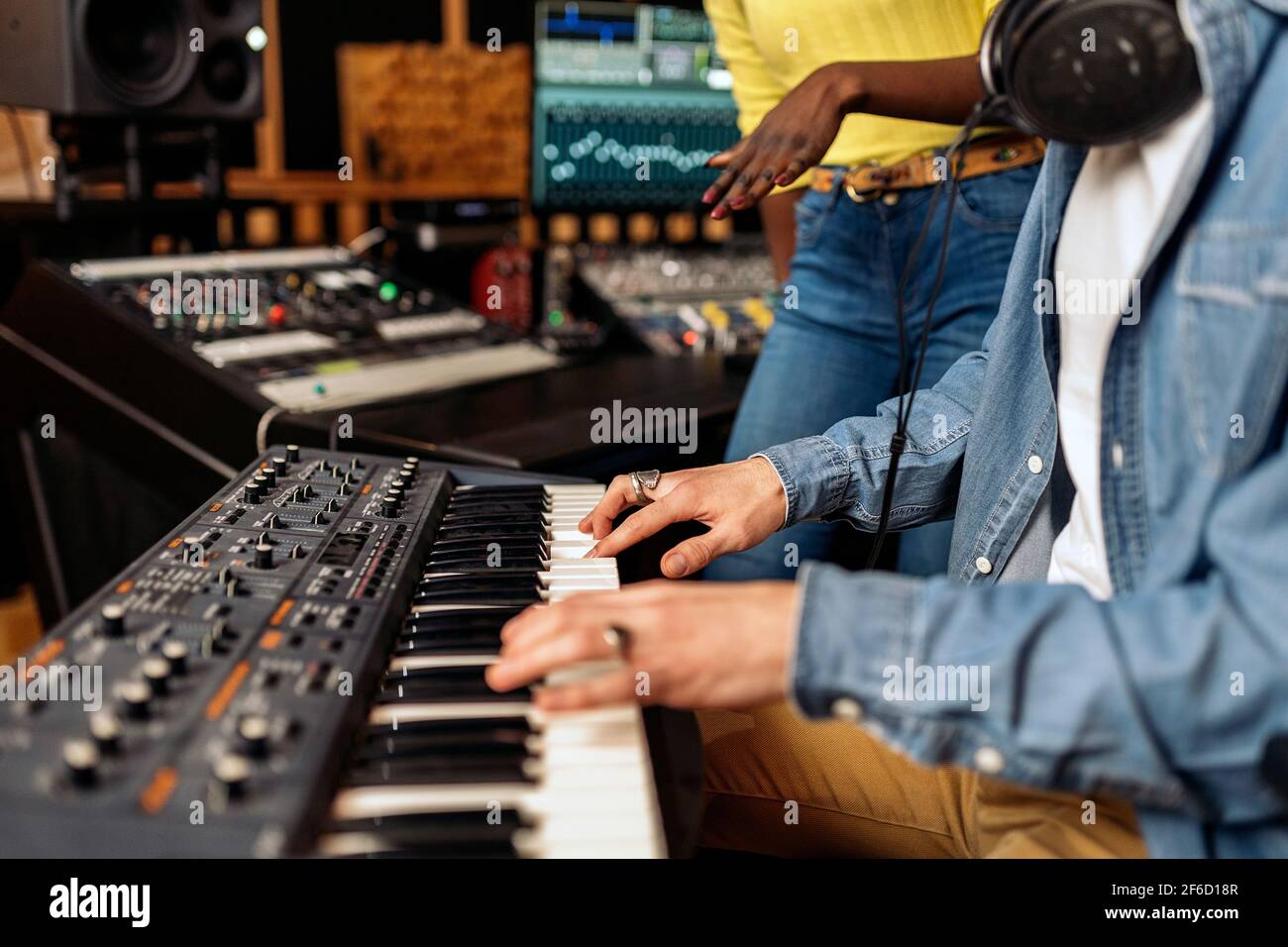 Stock photo of unrecognized musician in professional music studio ...