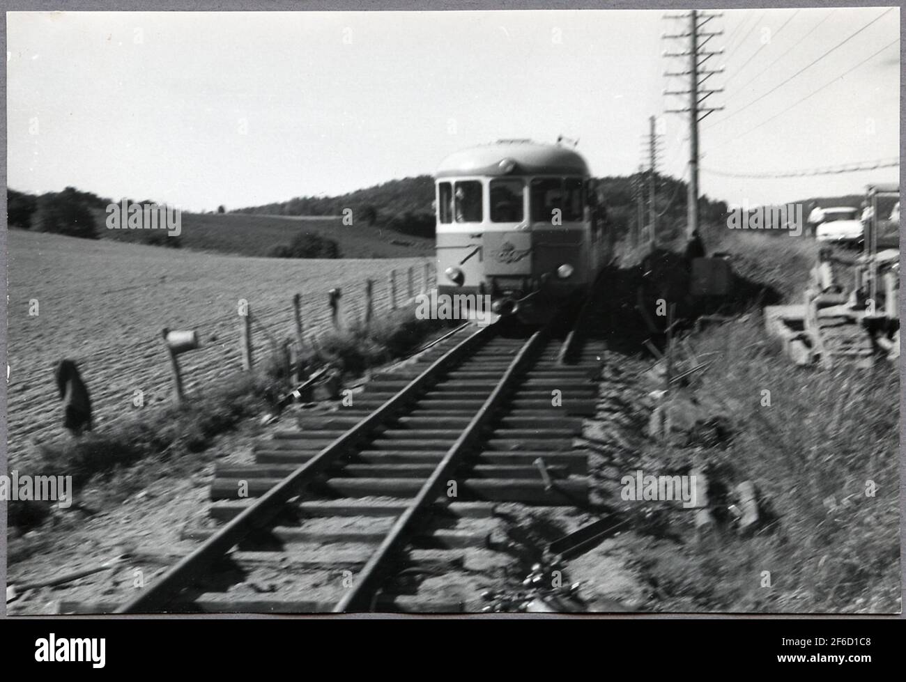 Rail bus passes the end point for three-skins 1963 on the line between ...