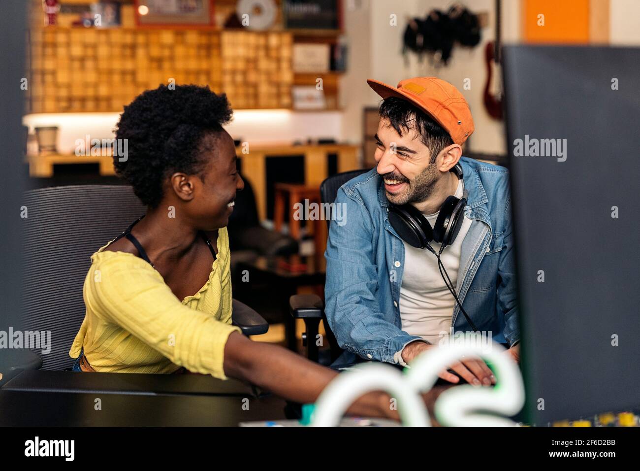 Stock photo of happy black singer working in professional music studio ...