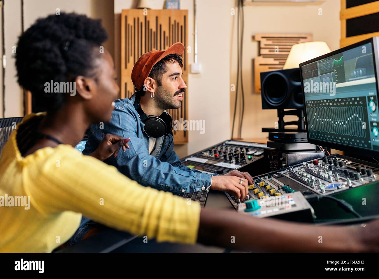 Stock photo of happy black singer working in professional music studio ...
