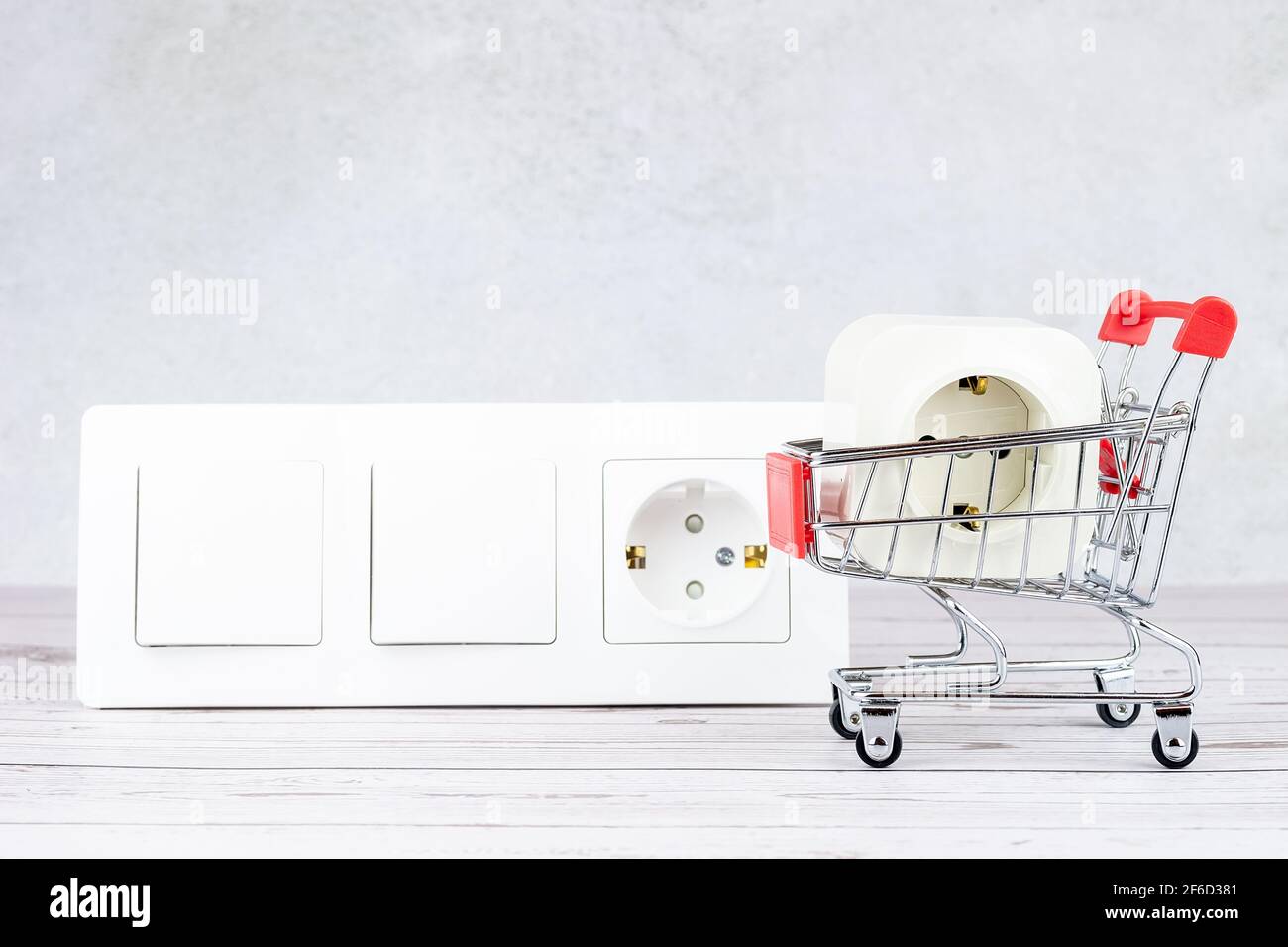 Plug Into Electricity Socket the power outlets on the wooden wall Stock ...