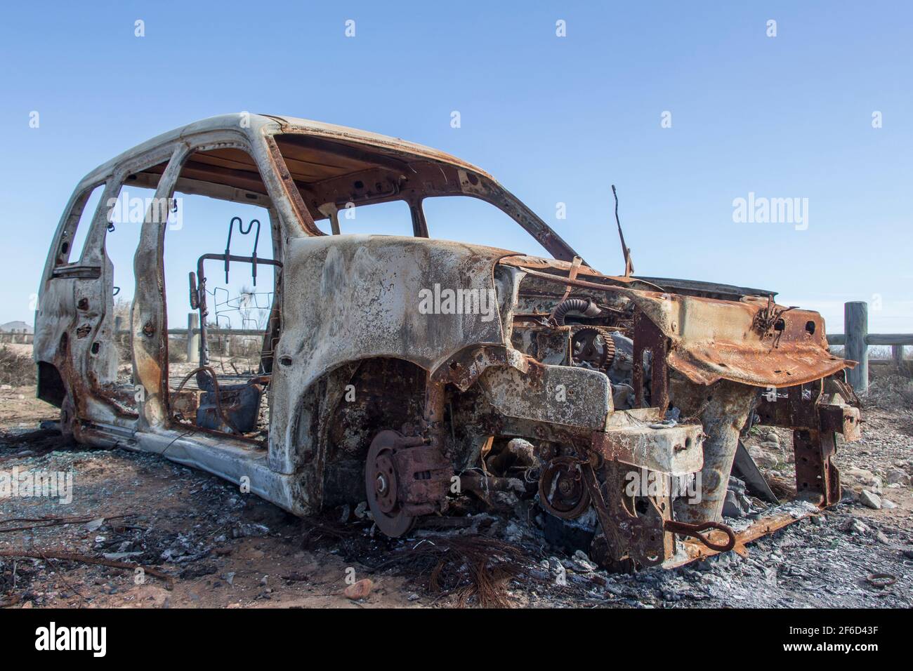 burned car abandoned, car destroyed bo fire, mini van Stock Photo - Alamy