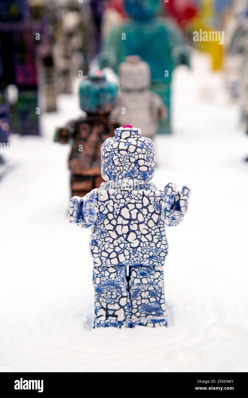 Ceramic lego people sculptures by artist Nam Tran 'Ego Man Army' at The ...