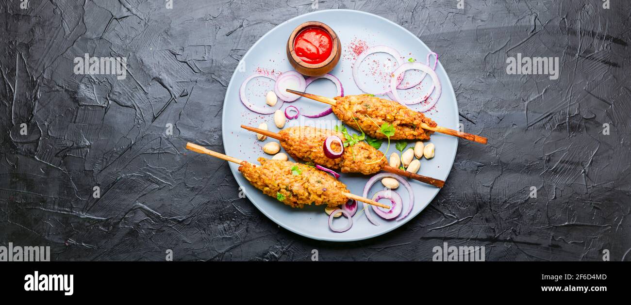 Juicy lula kebab made from meat.Minced meat on the grill Stock Photo ...