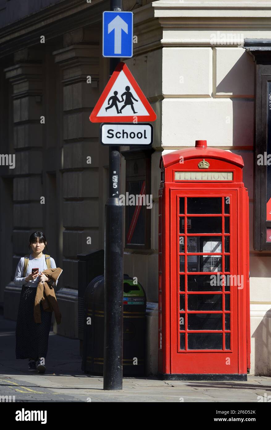 Walking past phone box hi-res stock photography and images - Alamy