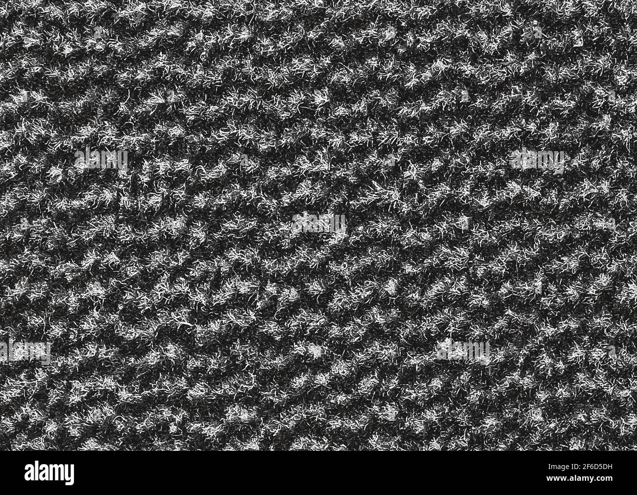 Dark carpet texture with abstract wavy pattern, background, close-up ...