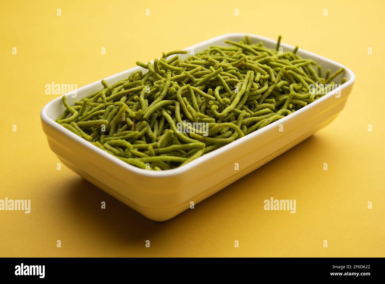 Spinach or palak sev are crunchy fried savory noodles. Homemade Thick ...
