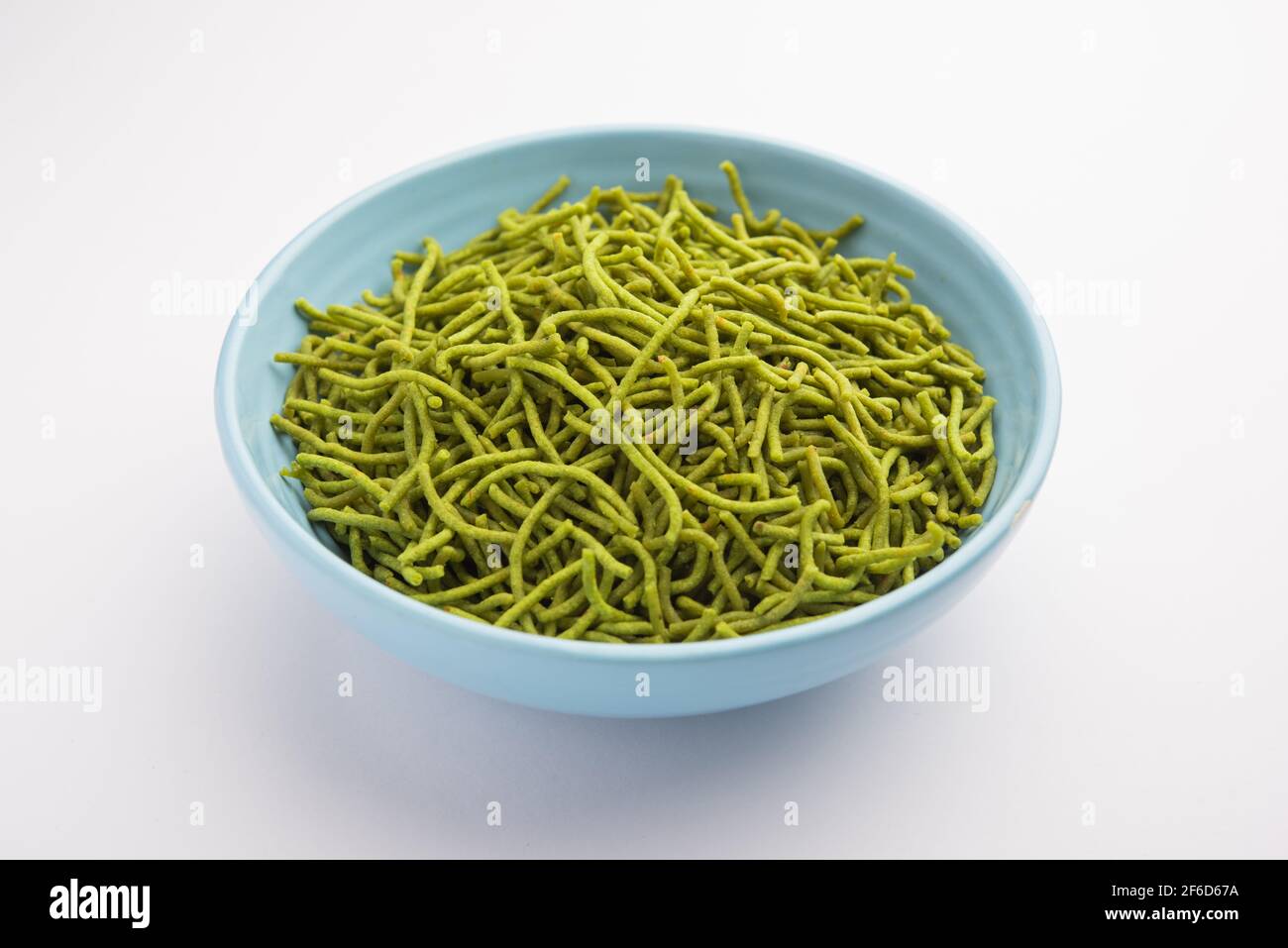 Spinach or palak sev are crunchy fried savory noodles. Homemade Thick ...