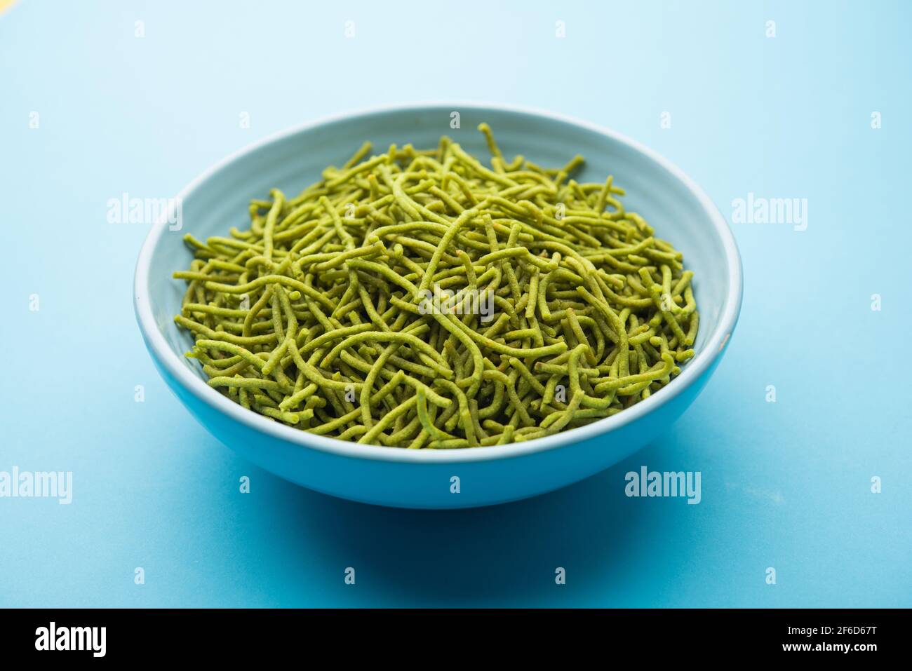 Spinach or palak sev are crunchy fried savory noodles. Homemade Thick ...