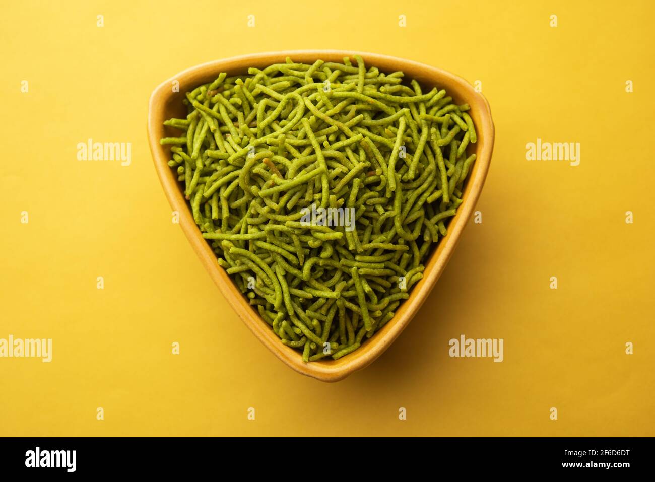 Spinach or palak sev are crunchy fried savory noodles. Homemade Thick ...