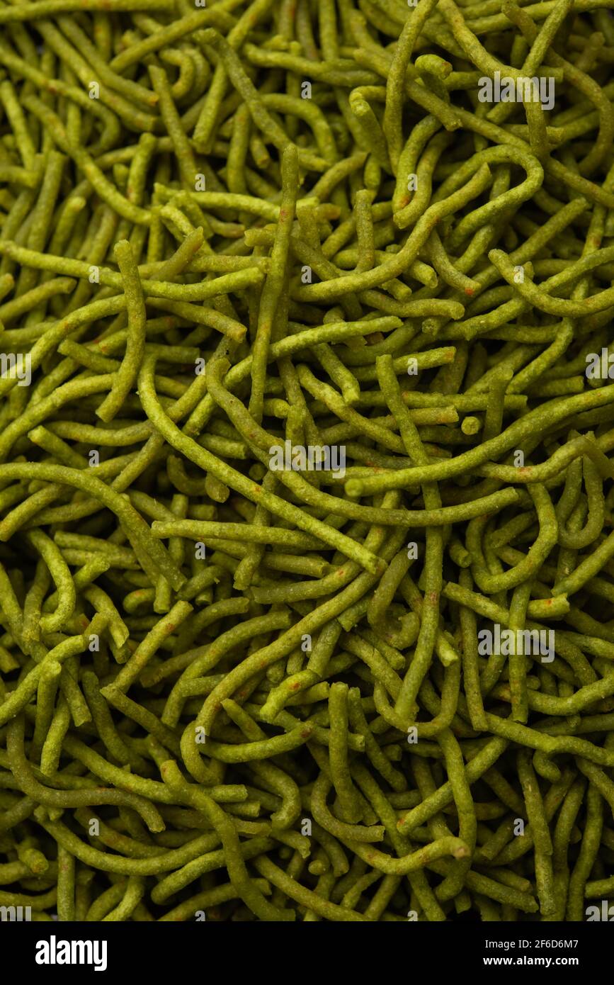 Spinach or palak sev are crunchy fried savory noodles. Homemade Thick ...