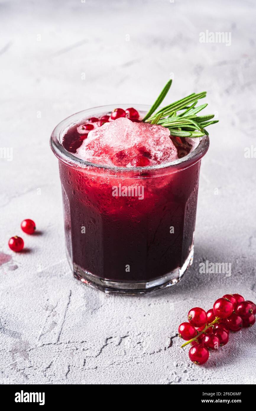 Fresh ice cold fruit cocktail in glass, refreshing summer red currant ...