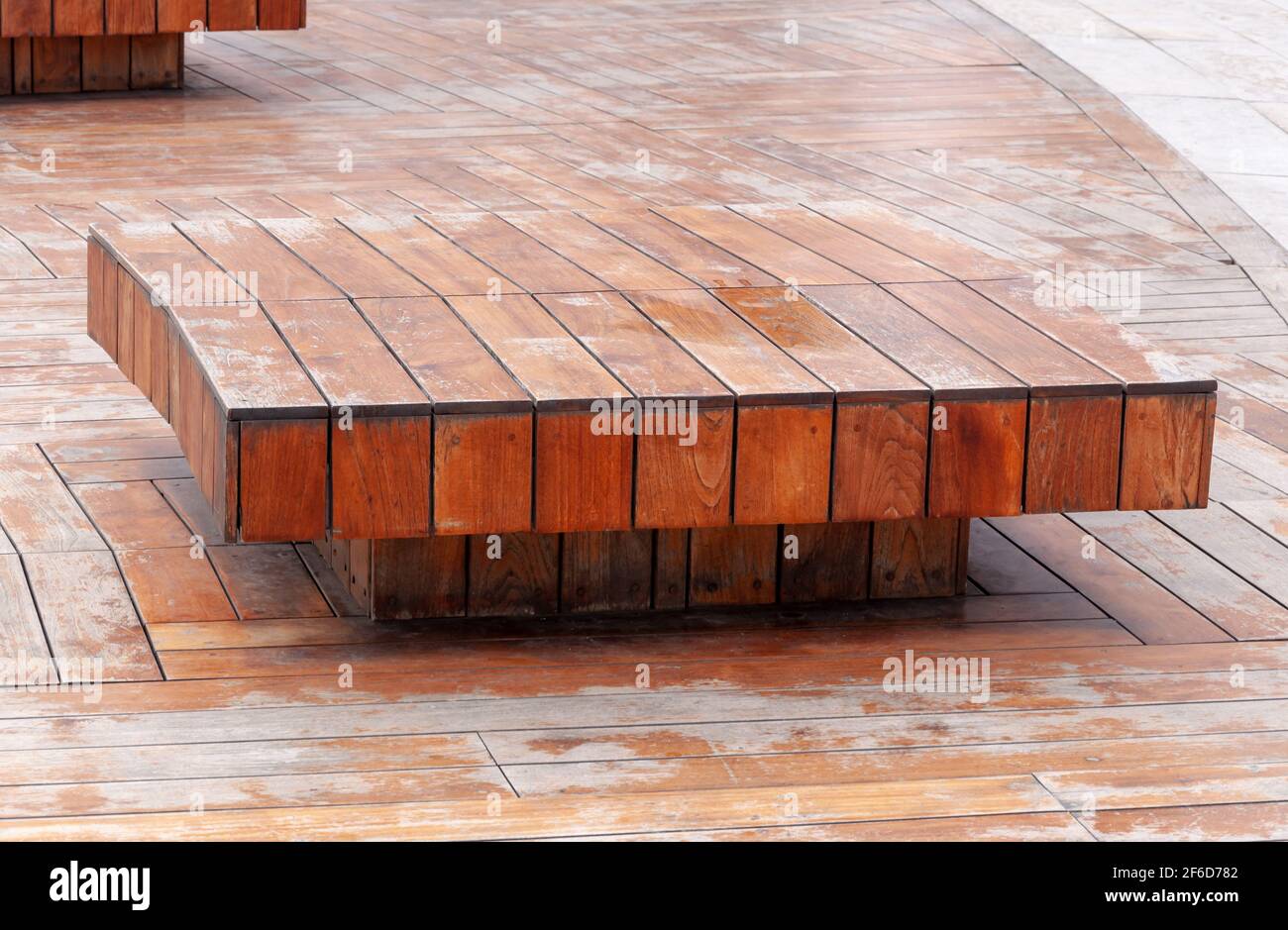 Surface of varnished wooden timbers. A park bench made of wood ...