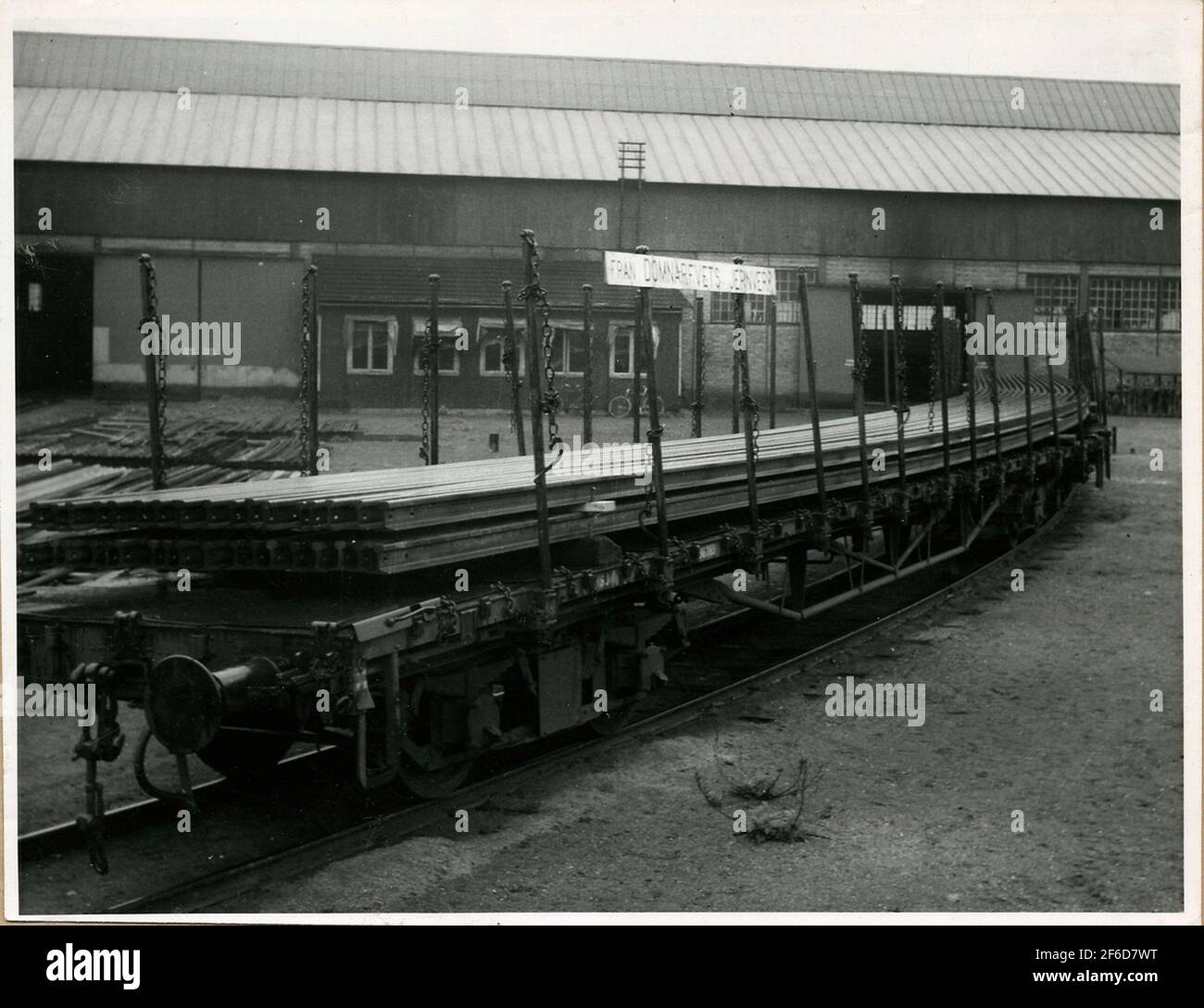 Rails loaded on the freight cart for transport Stock Photo - Alamy