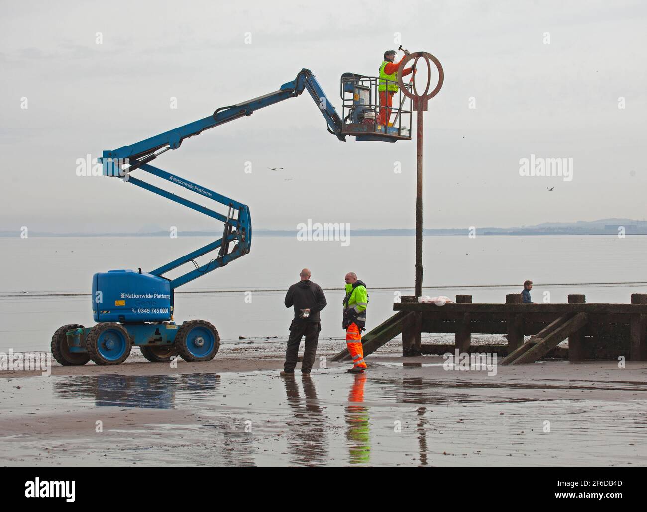 Installing signage hi-res stock photography and images - Alamy