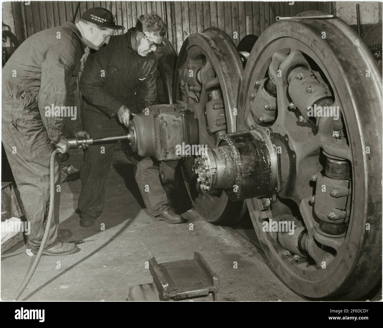 Folke Norgren and Axel Ericsson disassembles a storage box Stock Photo ...
