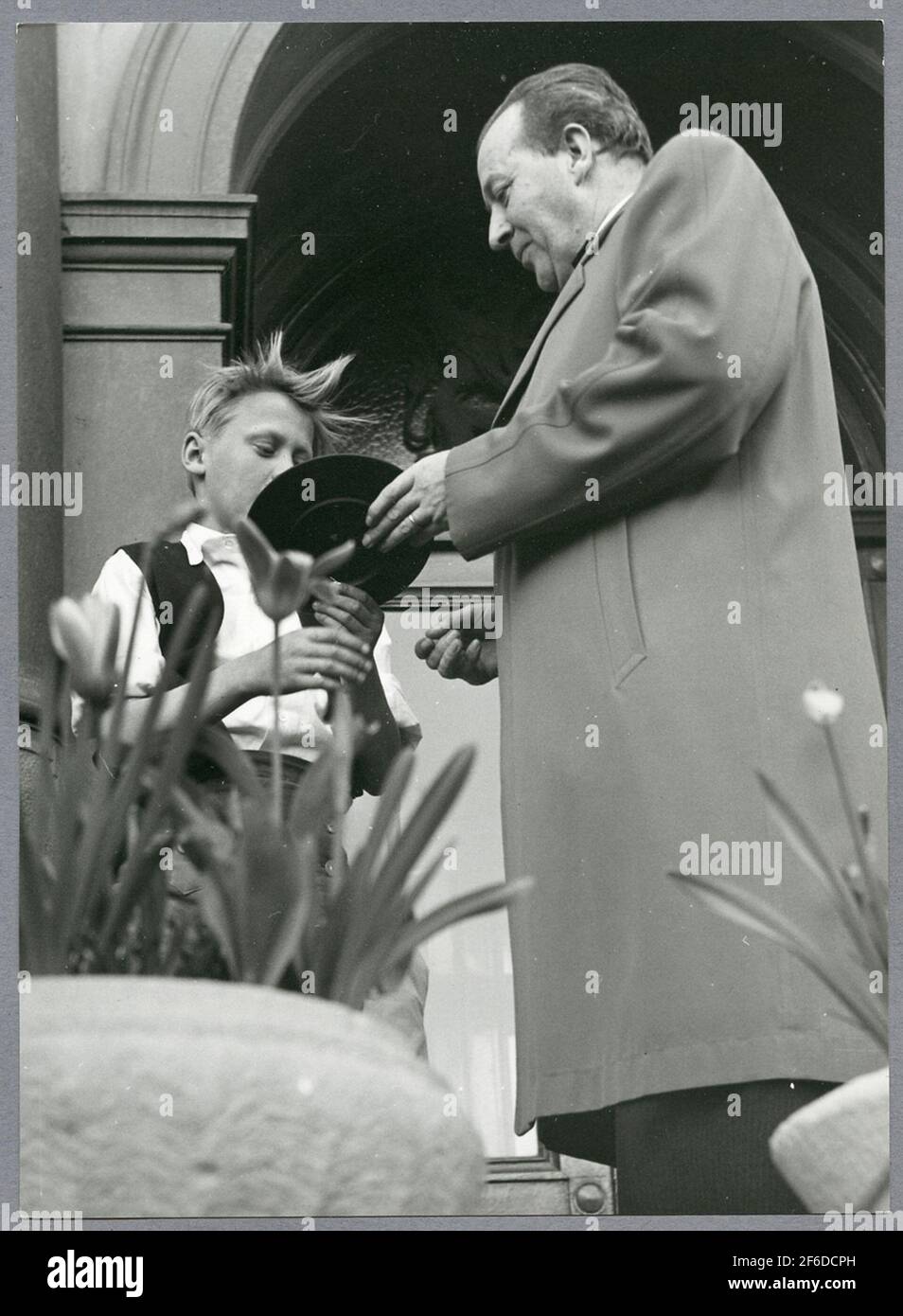 Alf Larsson Nils Holgersson receives a gift from the chairman of the ...