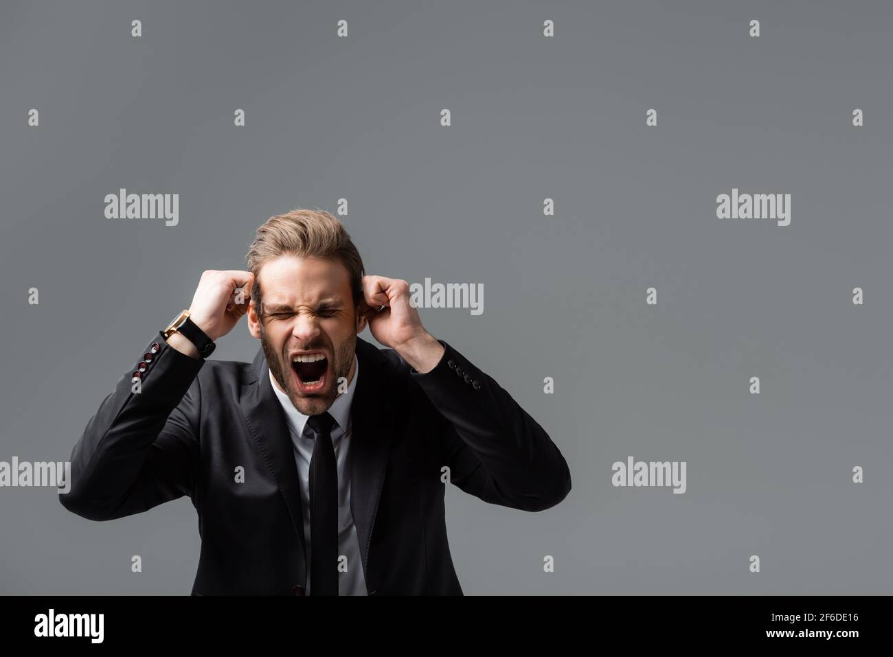 Angry man clenched fists hi-res stock photography and images - Alamy