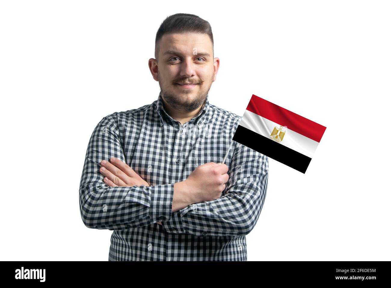 White guy holding a flag of Egypt smiling confident with crossed arms ...