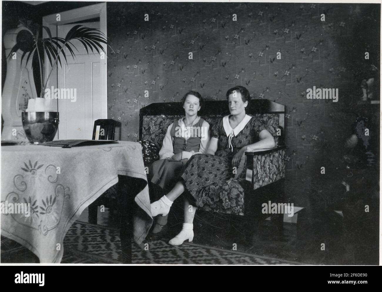 Smålenets: Sisters Ingeborg and Siri in Finsoffan. The floor clock is a ...
