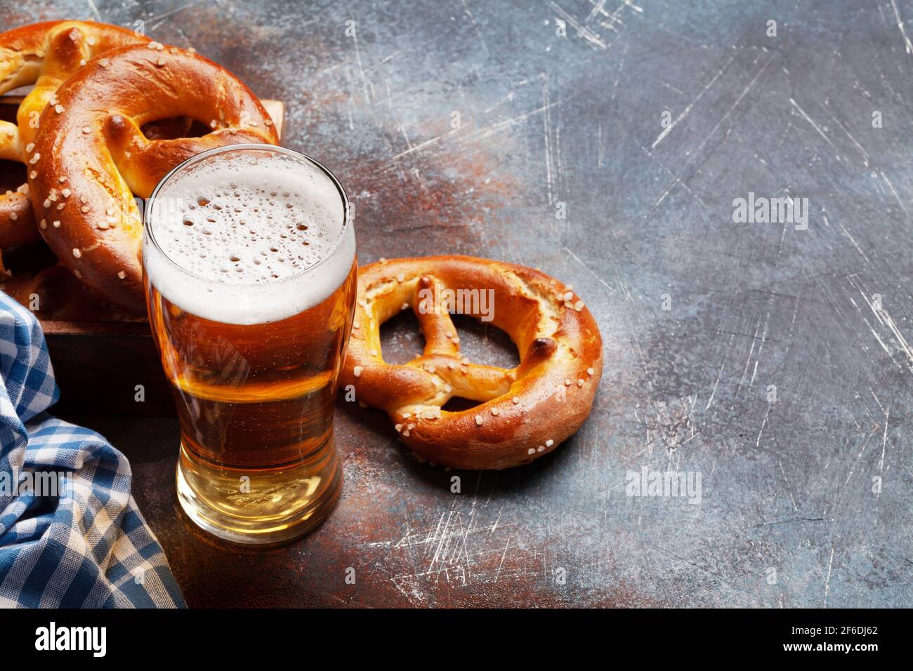 Lager beer mug and fresh baked homemade pretzel with sea salt. Classic ...