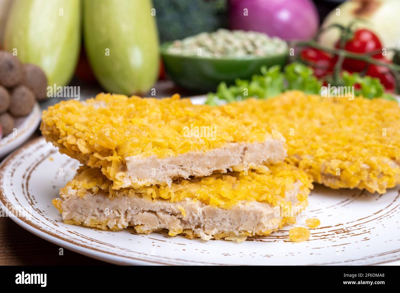 Vegetarian schnitzel made from grains, soybeans, mais, vegetables and ...