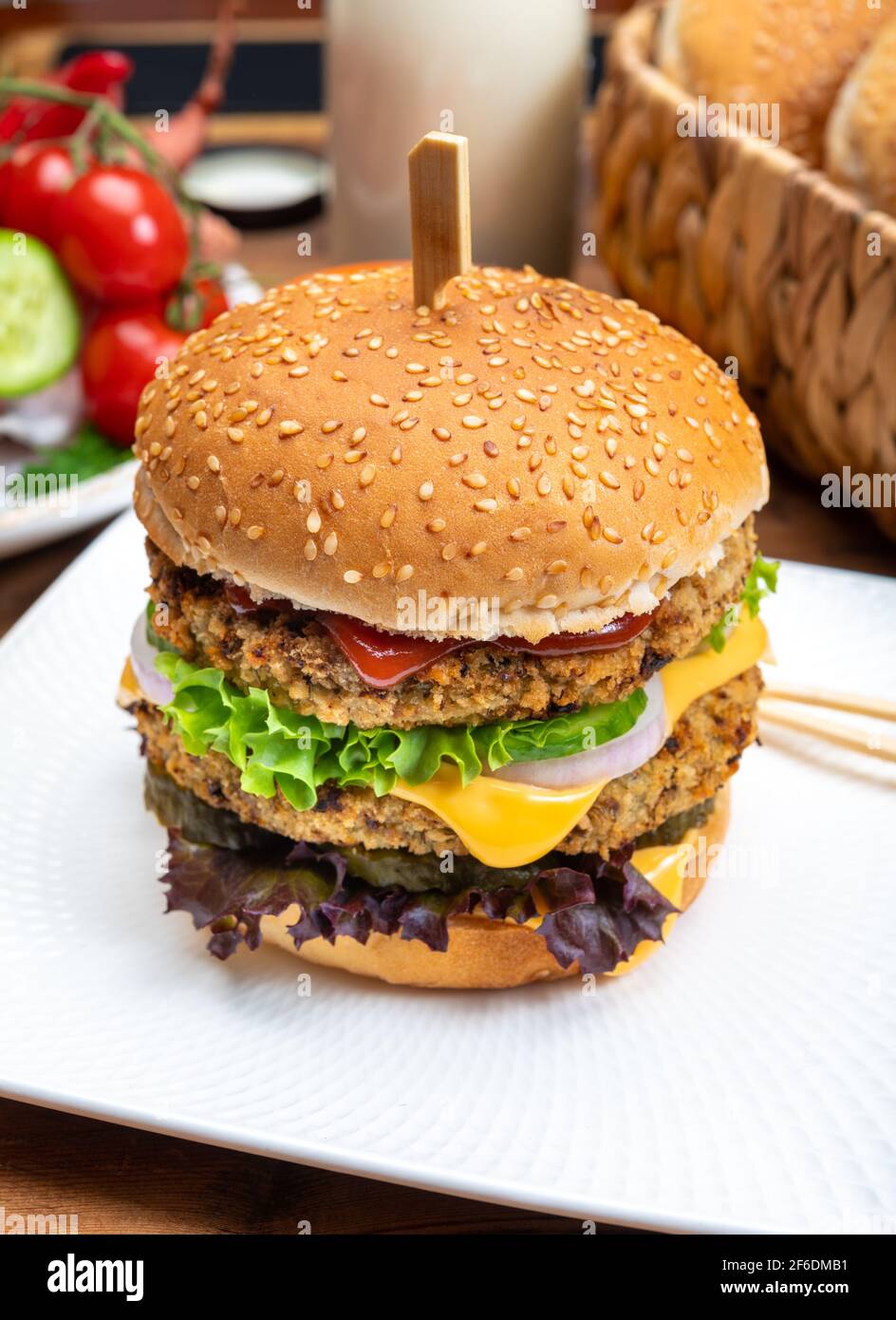 Tasty vegetarian cheeseburgers with round patties or burgers made from ...