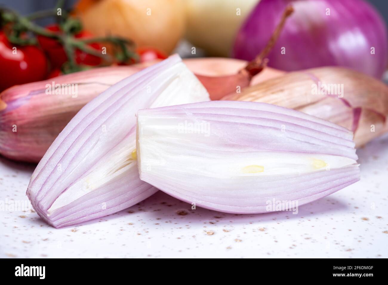 Onion collection, pink French shallot onlons close up Stock Photo - Alamy