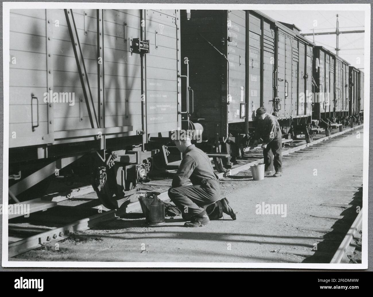 Staff at German freight wagon. German freight Deutsche Reiscbahn, DRB ...