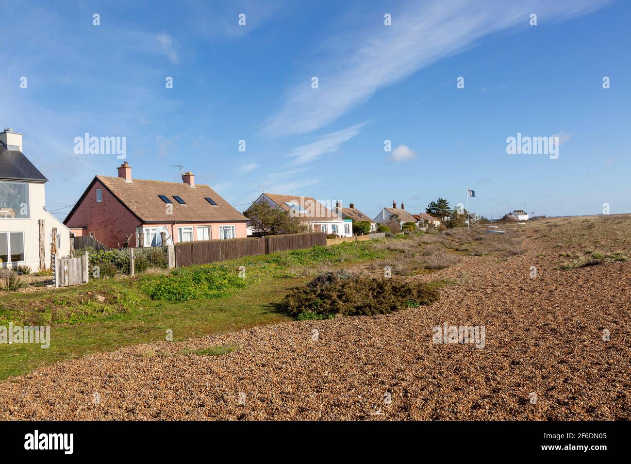 Houses on the beach coastal hamlet of Shingle Street, Hollesley Bay ...