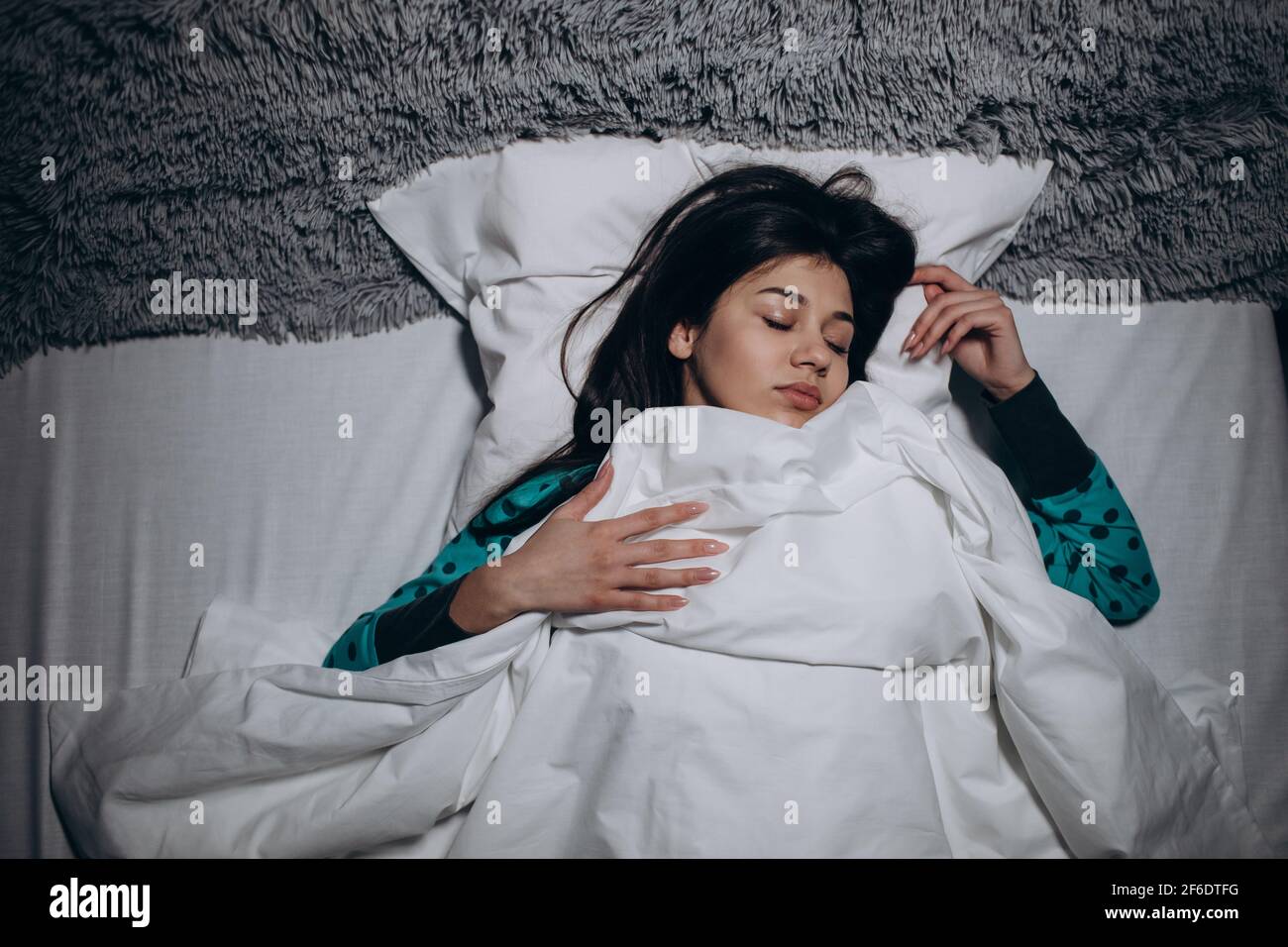 Beautiful woman dreaming at night Stock Photo - Alamy
