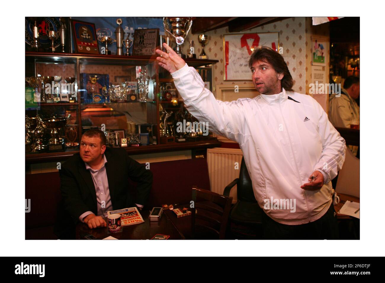 Andy Fordham behind the bar and playing darts in The Cutty Sark in ...