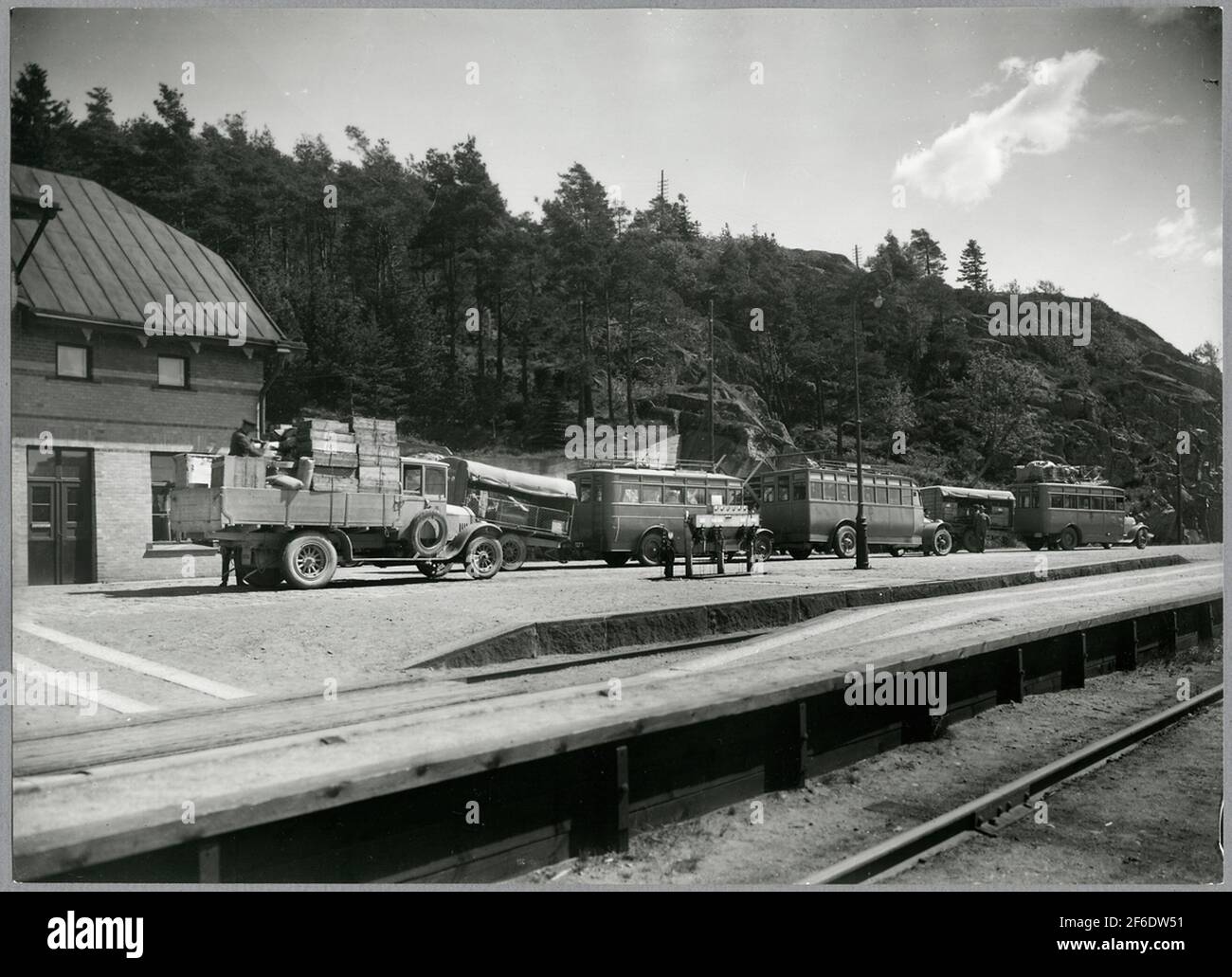 Buses and truck at Dingle Station. The state's railways, sj Stock Photo ...