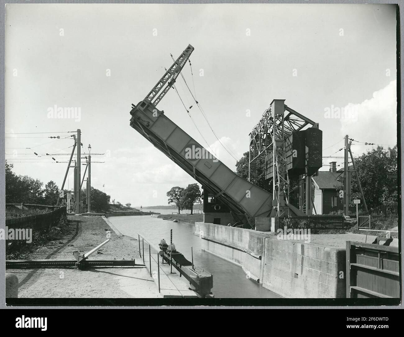 Opened flap bridge and broken contact on the contact line Stock Photo ...