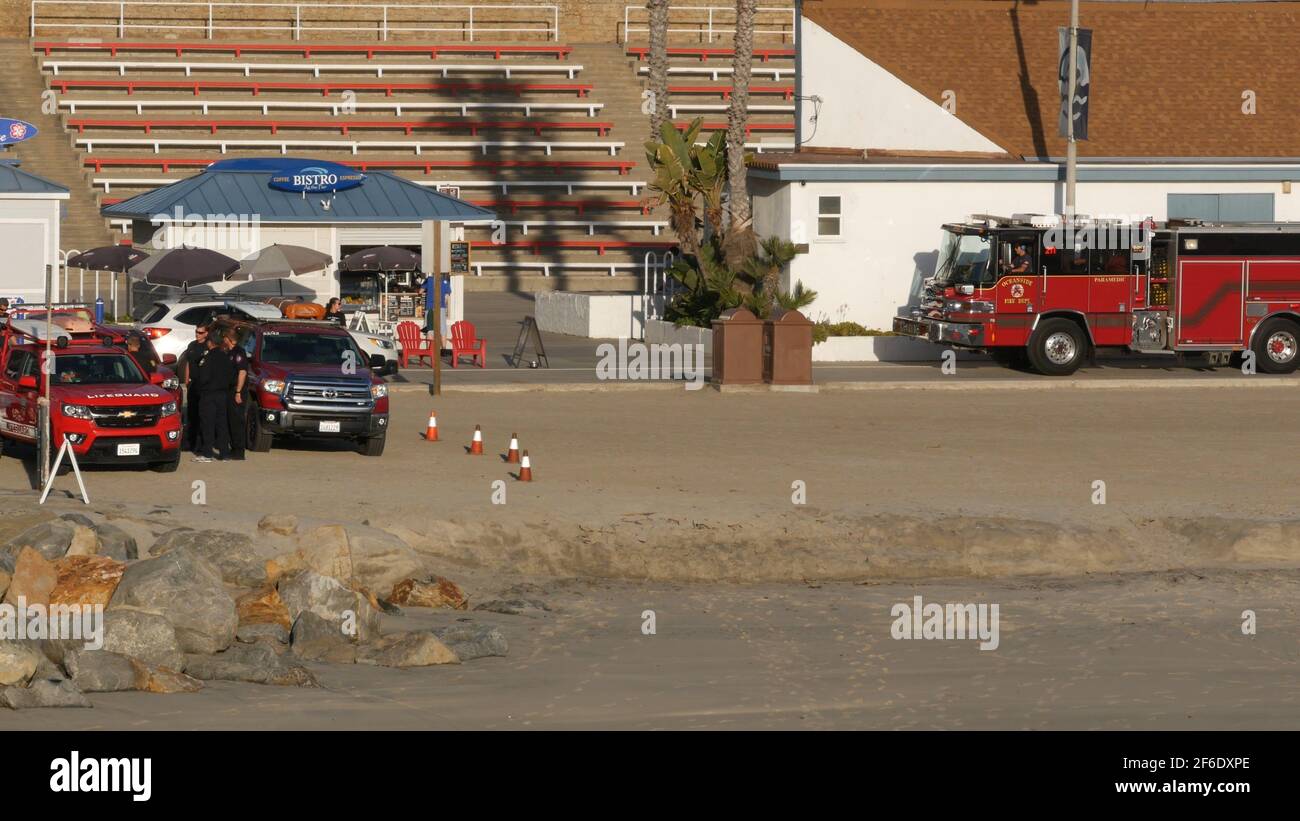 Oceanside, California USA -11 Feb 2020: Red fire engine by ocean beach ...