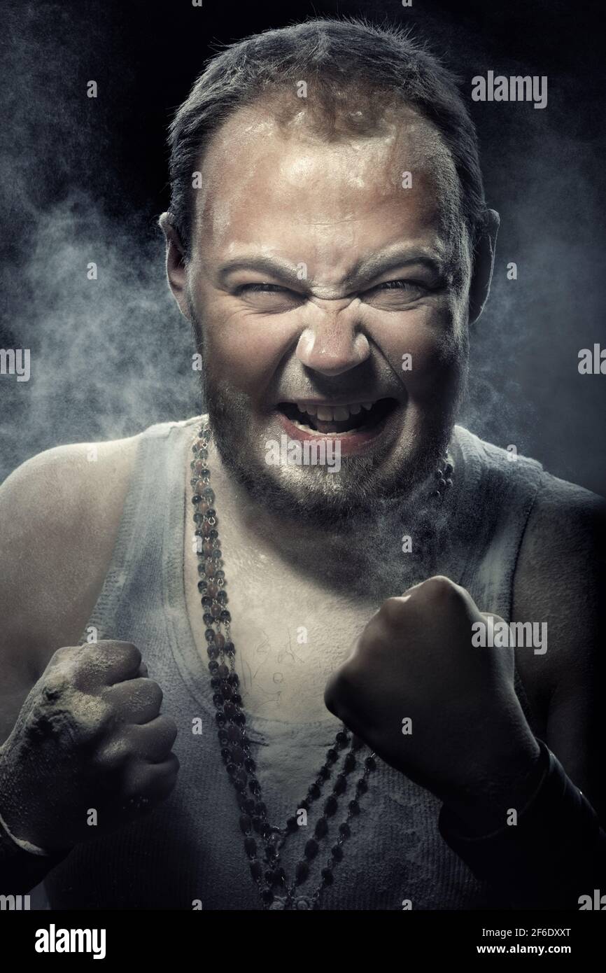 Portrait of the man in smoke and dust Stock Photo - Alamy