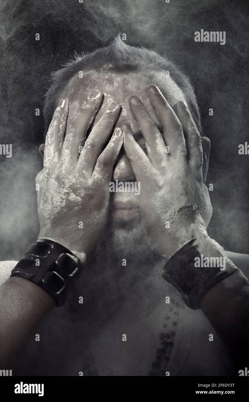 Portrait of the man in smoke and dust Stock Photo - Alamy