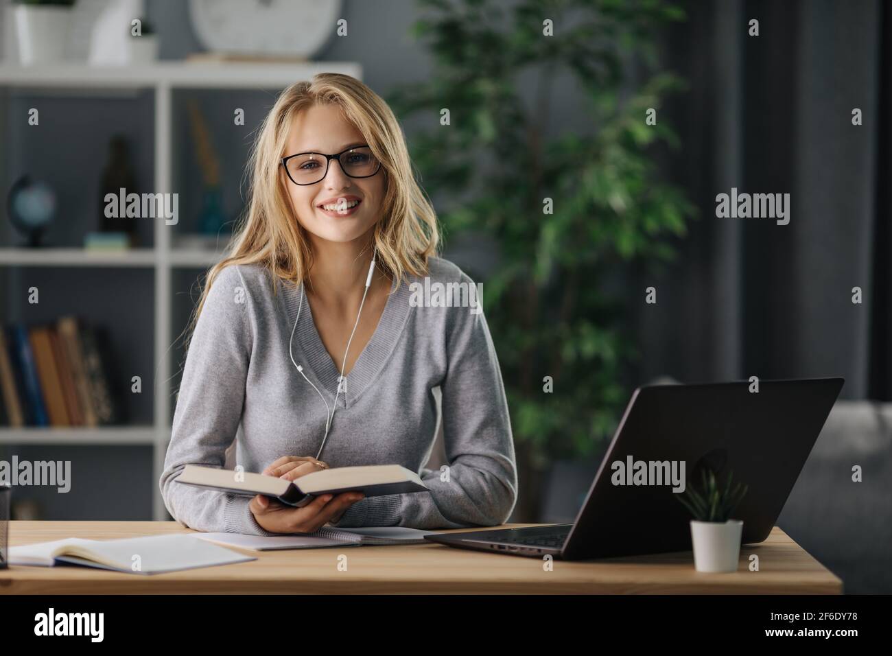 Happy young student studying home hi-res stock photography and images ...