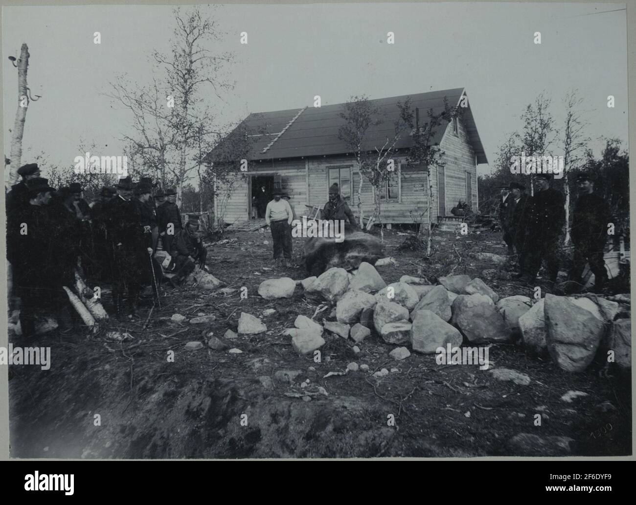 Sami offered to buy a bear skin Stock Photo - Alamy