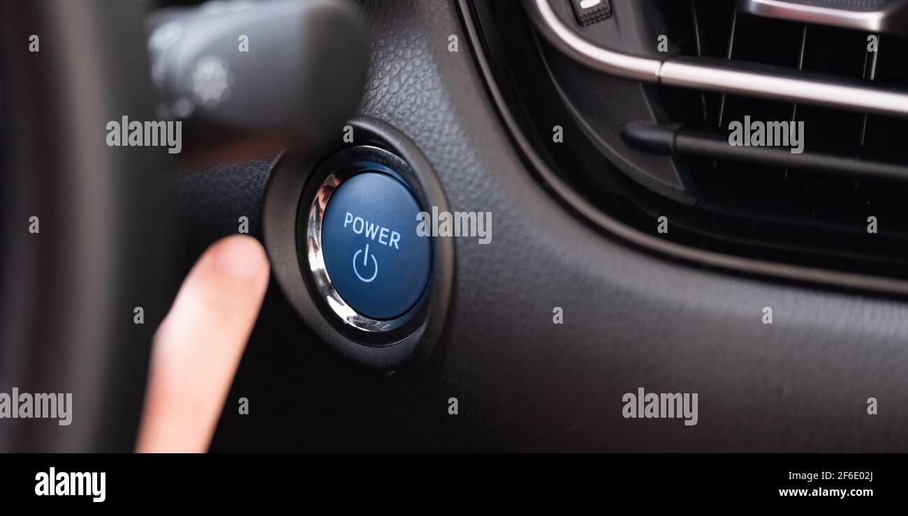 Woman pushing engine start hi-res stock photography and images - Alamy