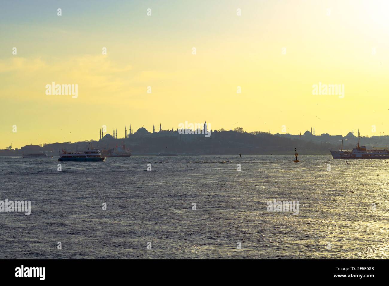 Ferry and Cityscape of Istanbul at sunset. Istanbul background photo ...