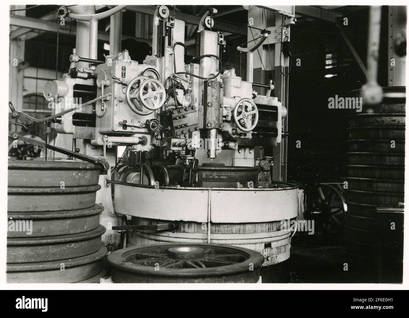Lathe for turning wheel rings and hubs inside Stock Photo - Alamy