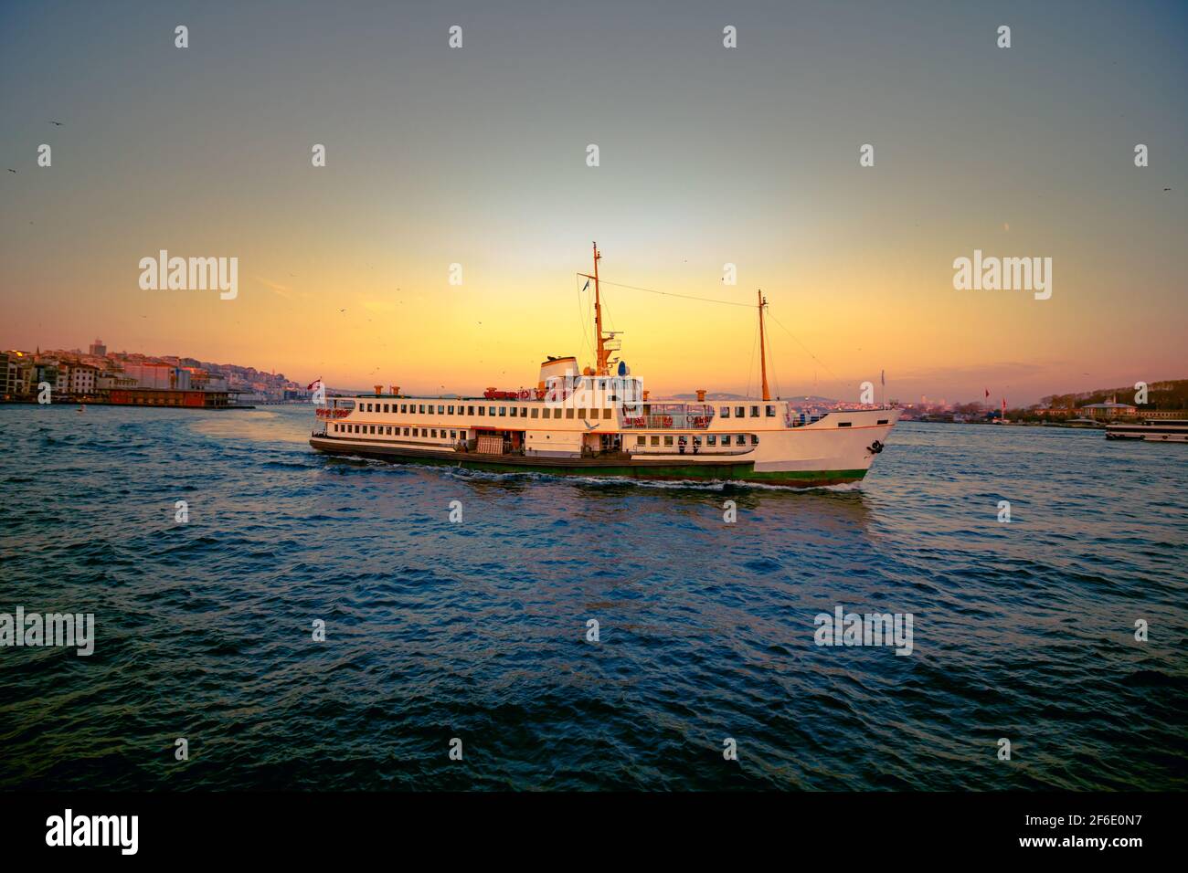 Ferry and Cityscape of Istanbul at sunset. Istanbul background photo ...
