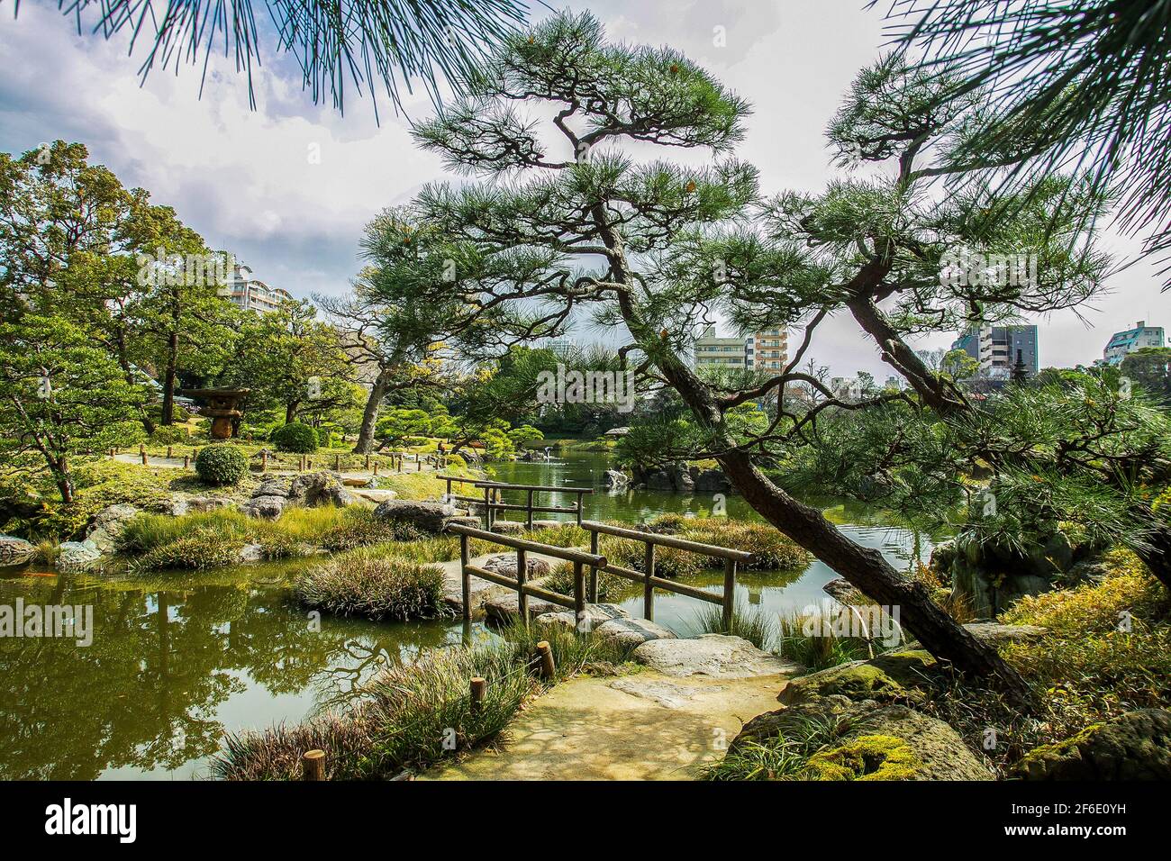 Idyllic landscape with stone path through pond - zen-like japanese ...