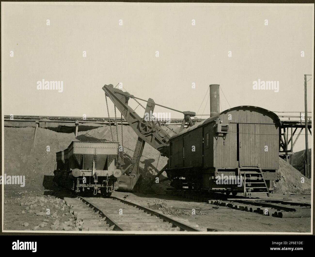 Loading ore with steam-powered bucket cart Stock Photo - Alamy