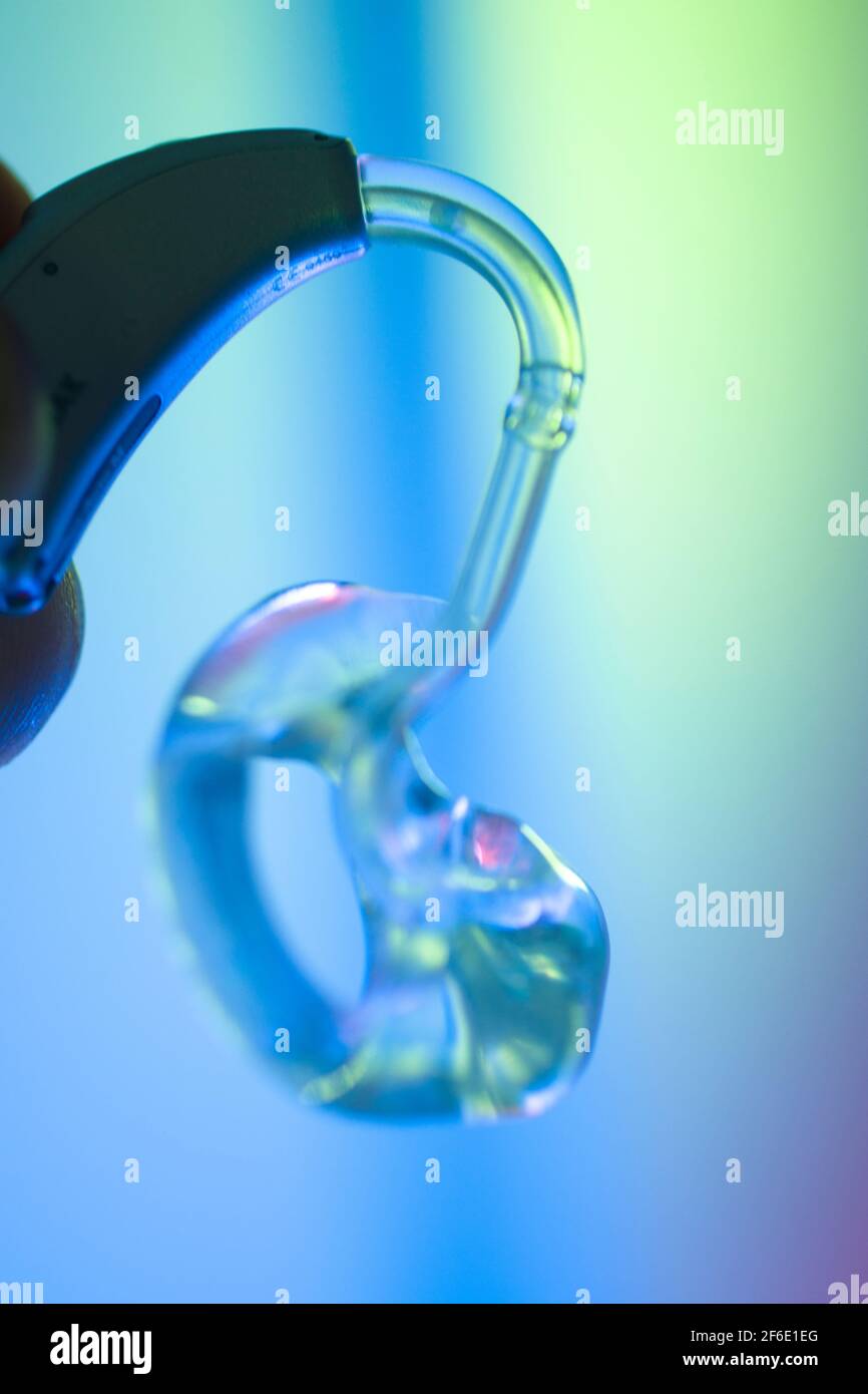 Modern digital hearing aid for deafness and deaf people Stock Photo - Alamy